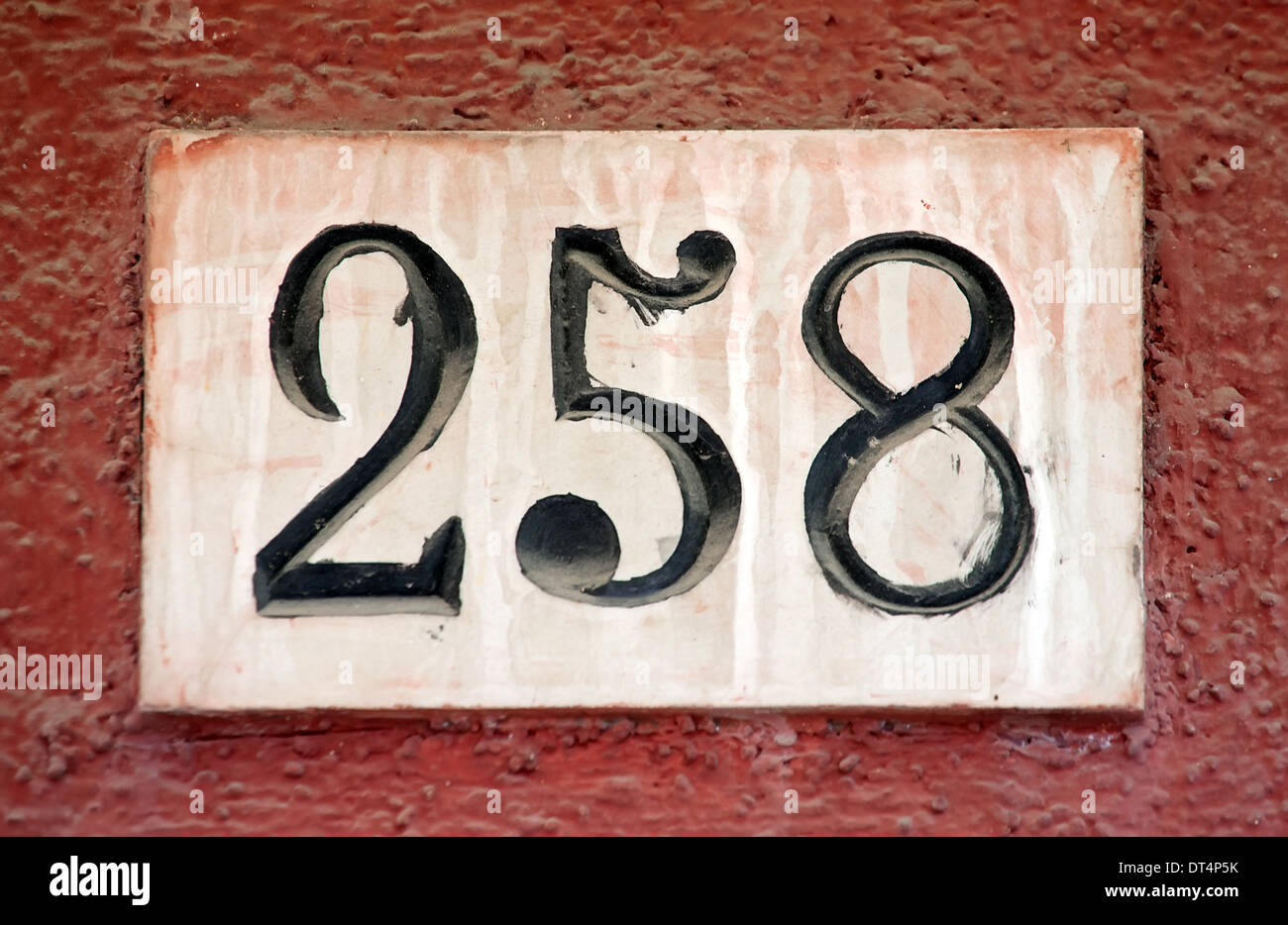 closeup of decorated house number digits sign on the wall Stock Photo ...