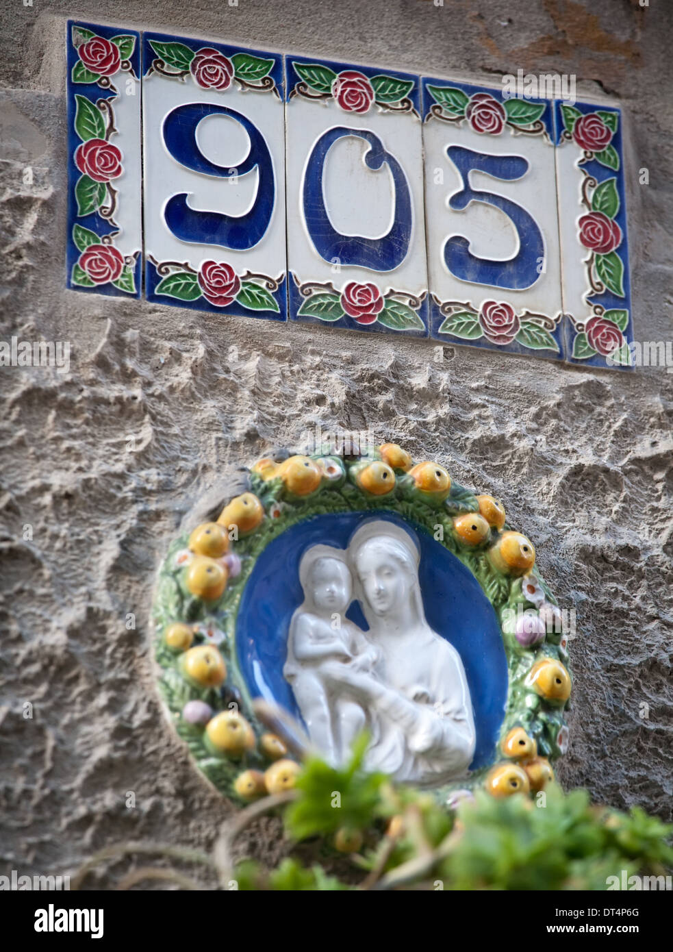 closeup of decorated house number digits sign on the wall Stock Photo ...