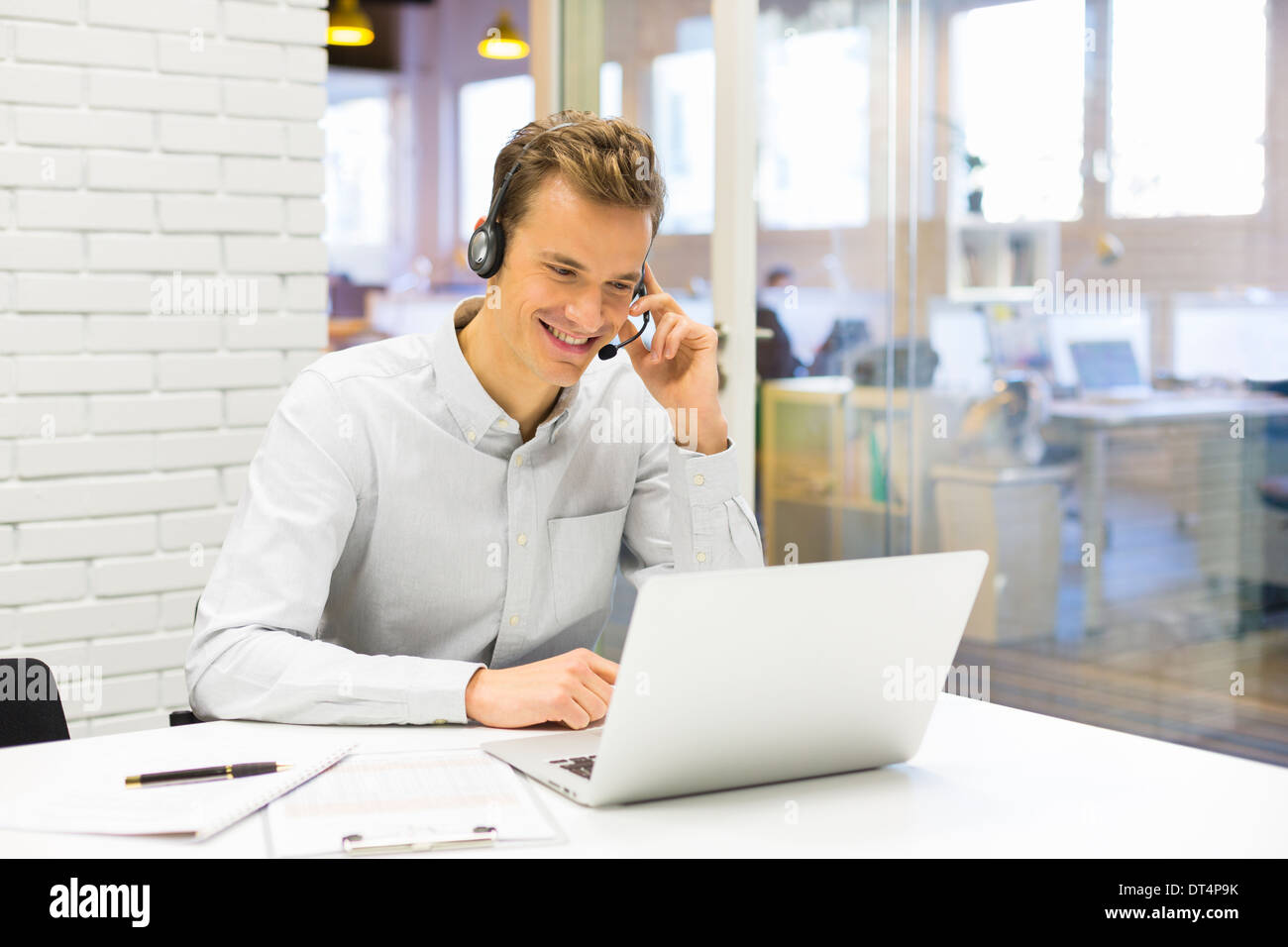 Cheerful male calling computer desk video conference, Skype Stock Photo ...