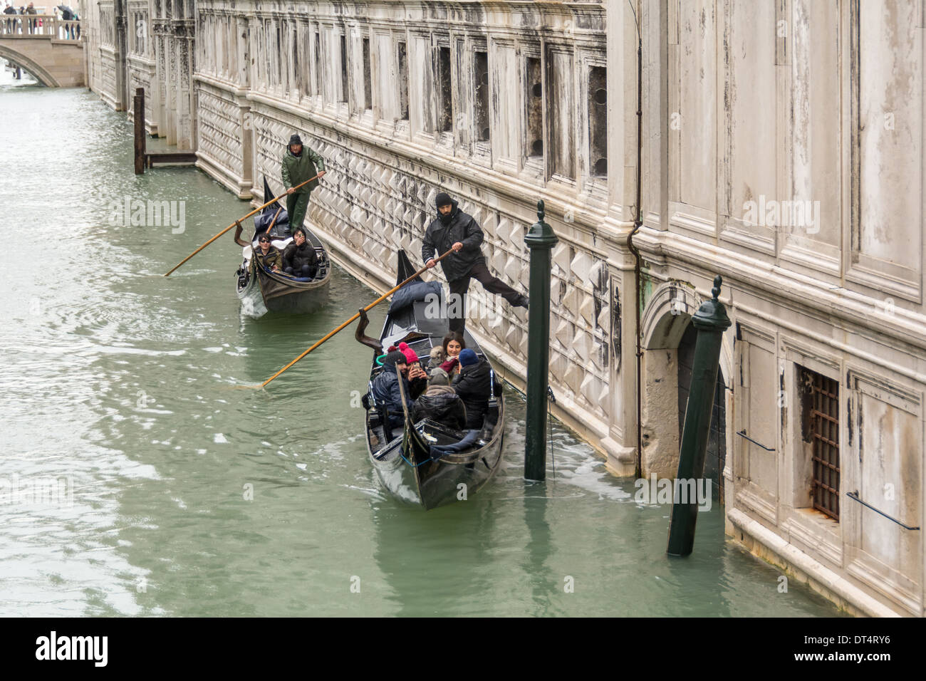 Venice, Italy. Two Venetian Gondoliers navigating their Gondolas on the ...