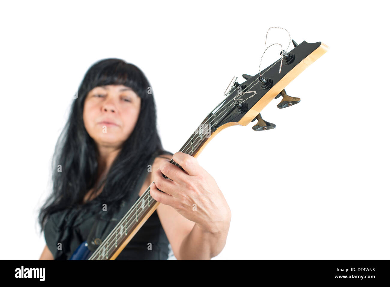 Woman playing a bass guitar on white background Stock Photo - Alamy