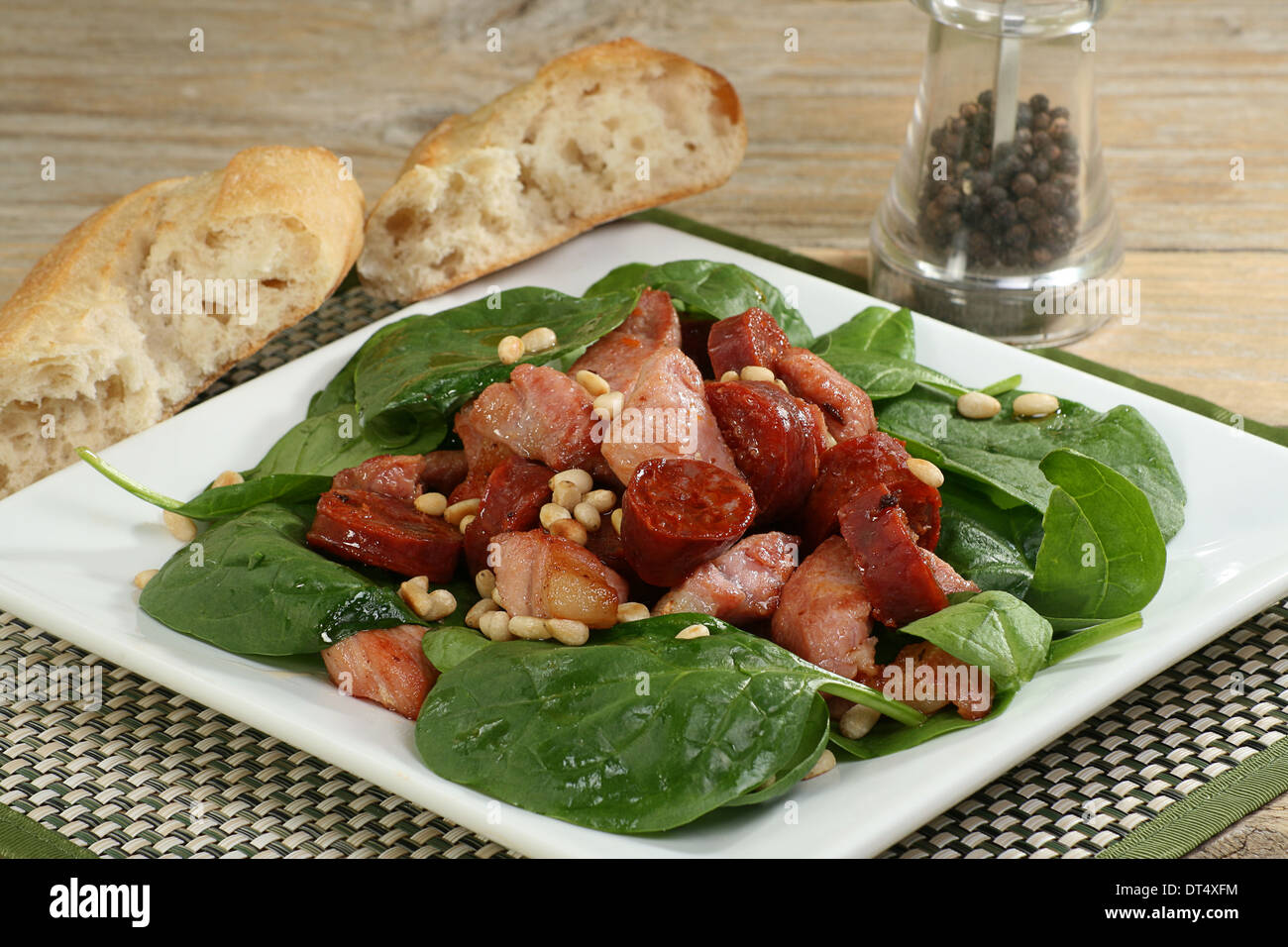 delicious sliced chorizo, with crispy bacon and spinach Stock Photo - Alamy
