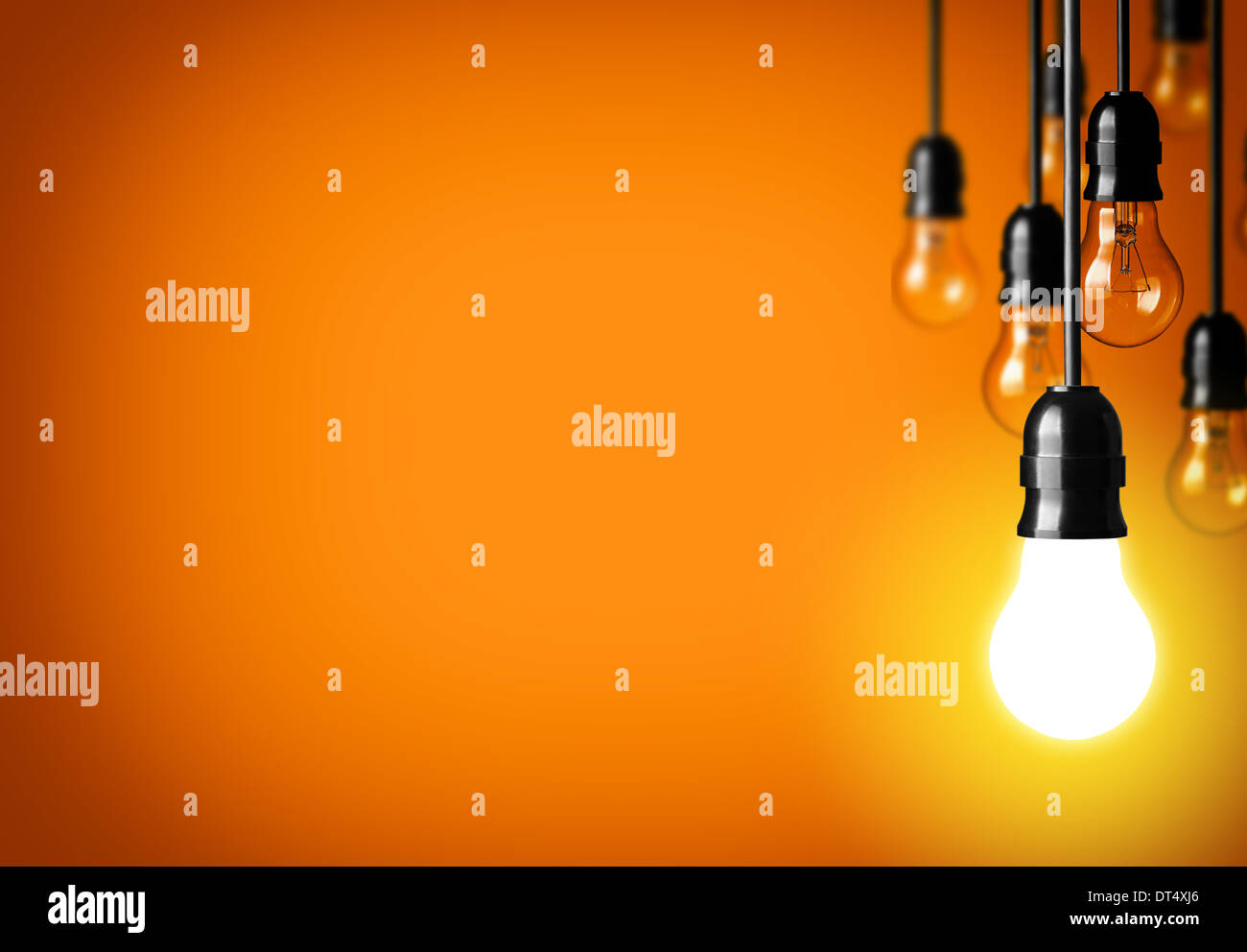 Idea concept on orange background Stock Photo - Alamy