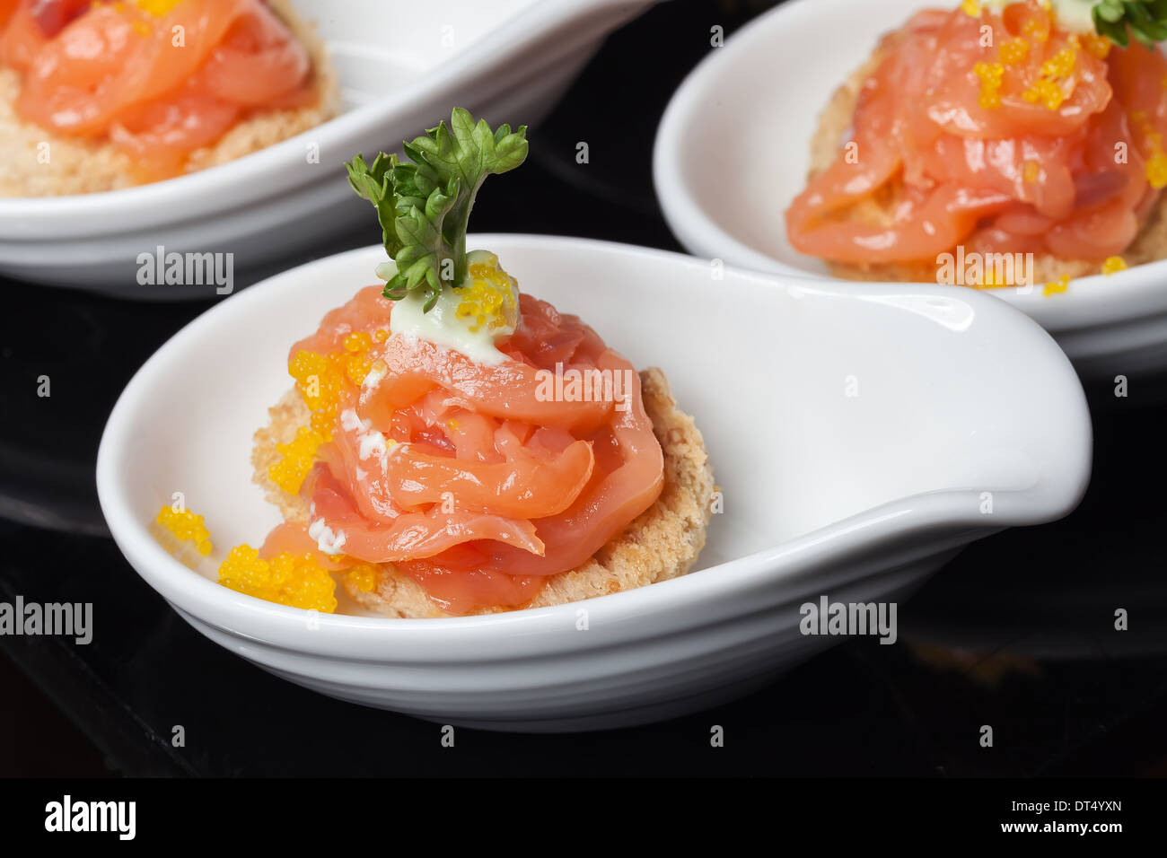 Fresh fish on bread appetizer Stock Photo - Alamy