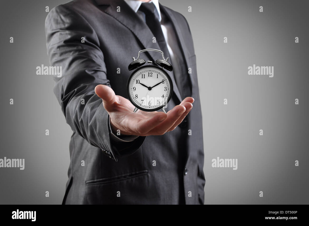 Alarm clock in hand hi-res stock photography and images - Alamy