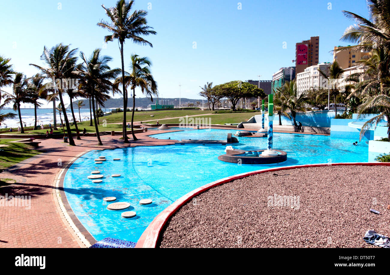 DURBAN, SOUTH AFRICA - FEBRUARY 8, 2014: Bright blue swimming pool on ...