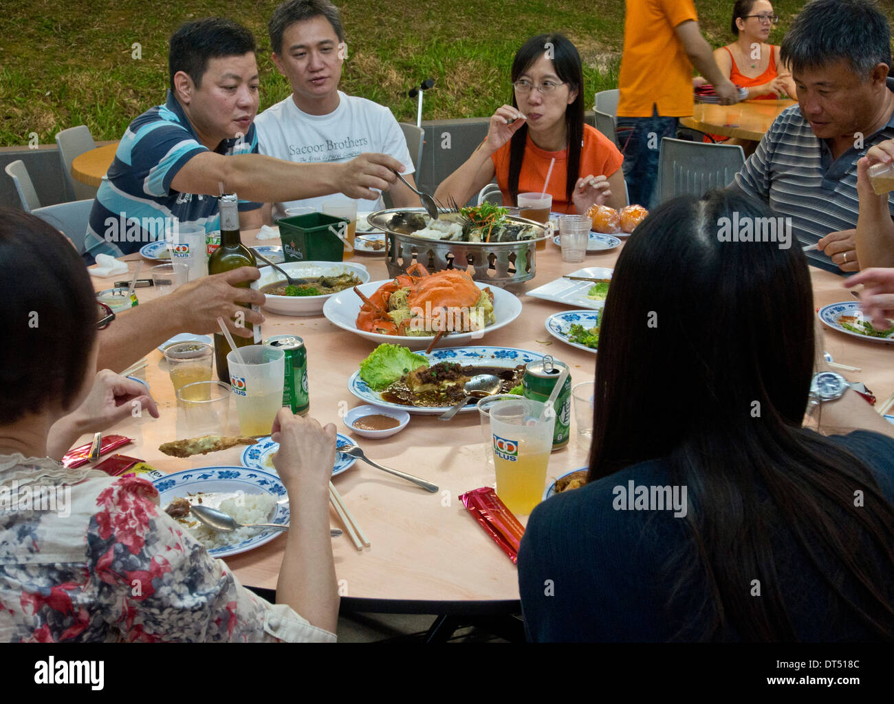 Colleagues from office having lunch in Chinatown on the eve of Chinese ...