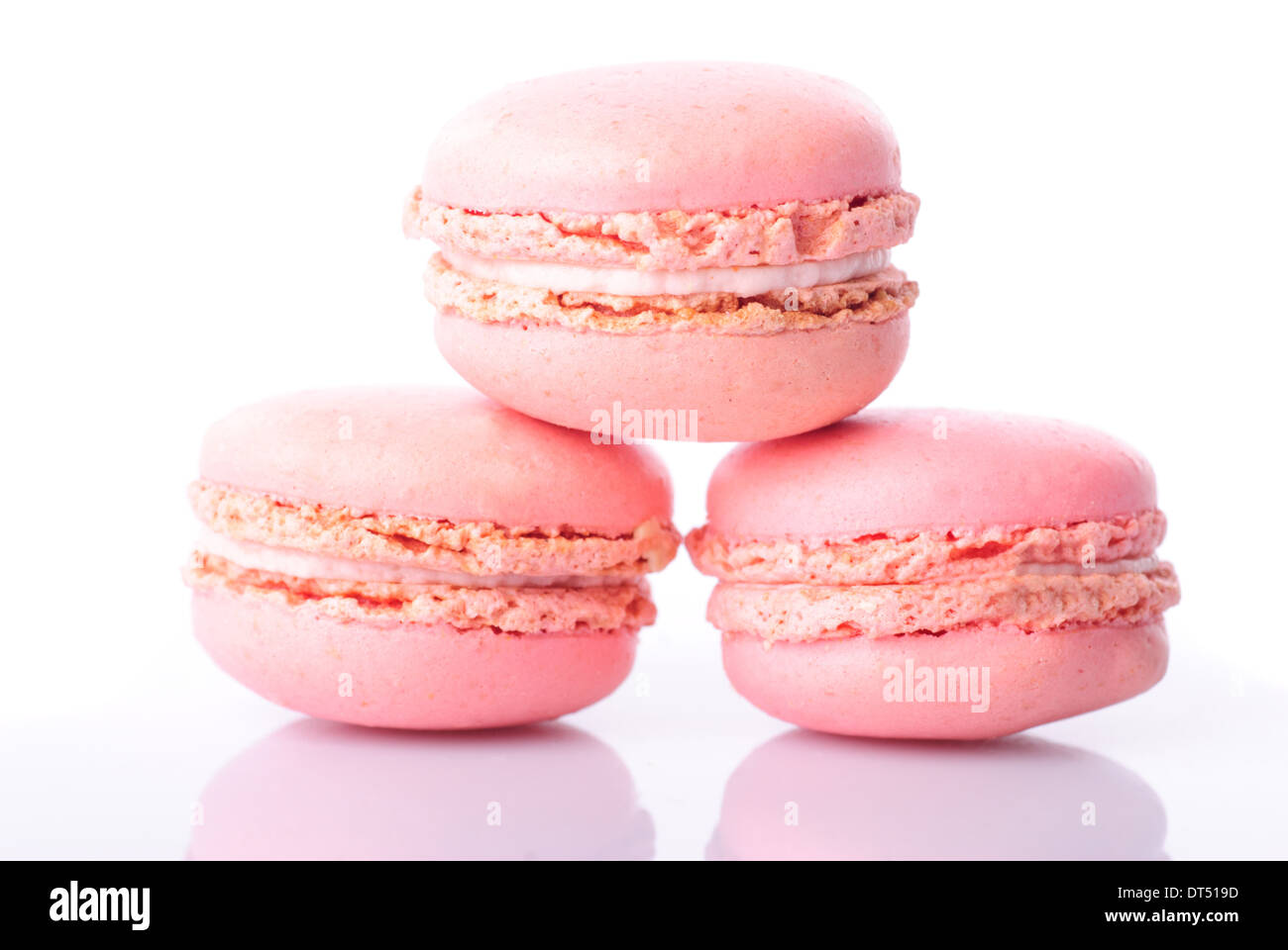 Pink macaroones isolated on white close up Stock Photo - Alamy