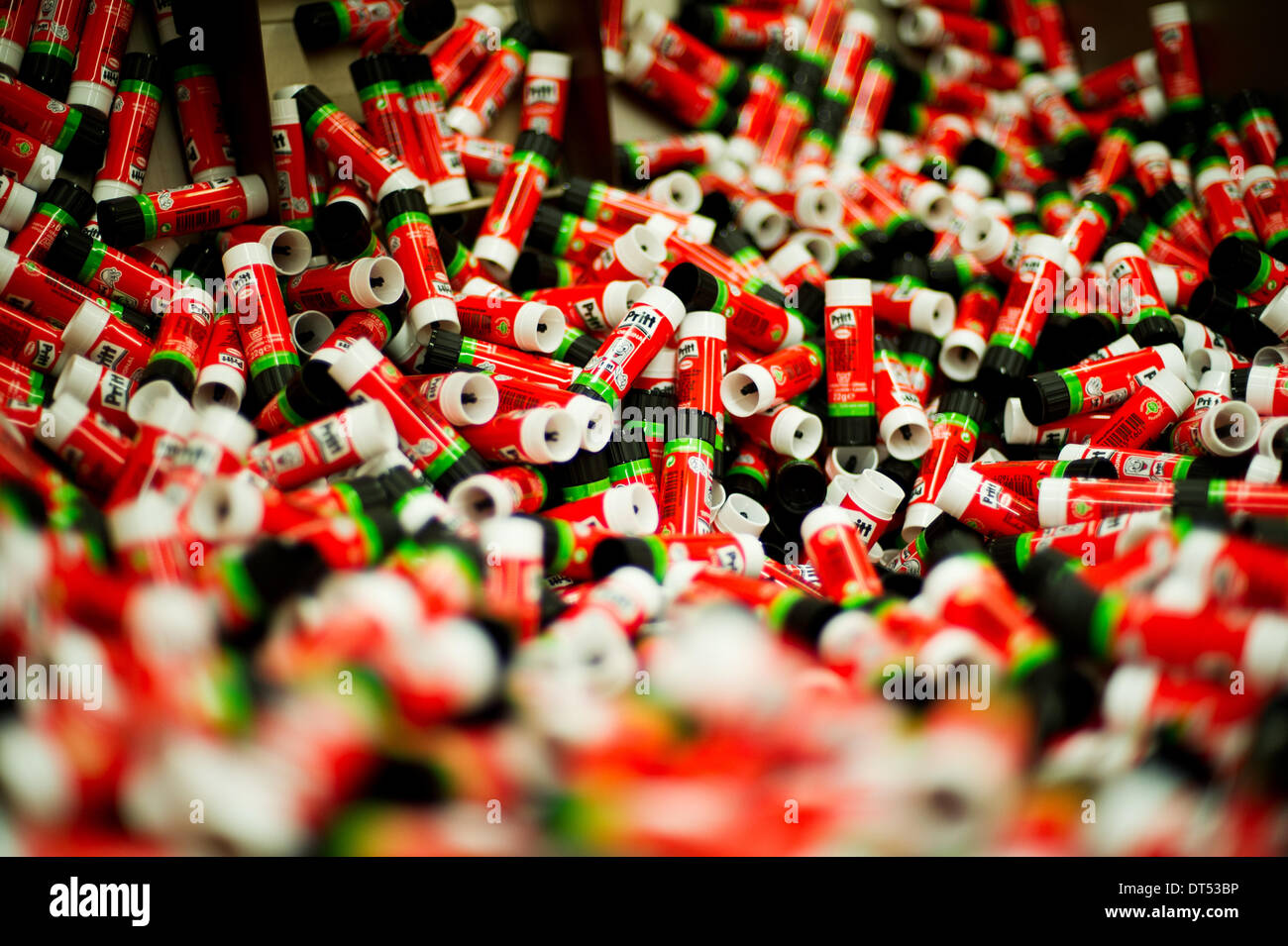 Duesseldorf, Germany. 16th Jan, 2014. Pritt sticks in a machine on the ...