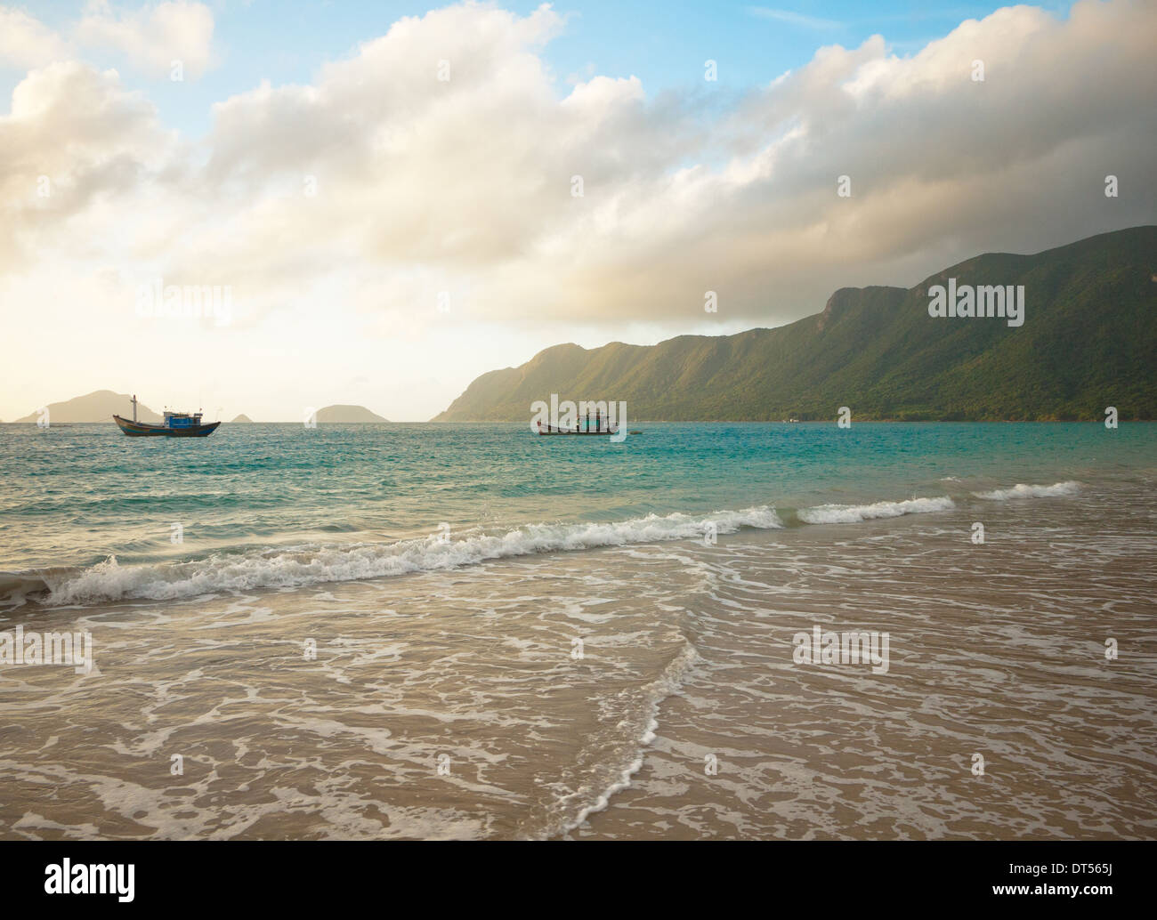 A view of boats and the South China Sea off the shore of An Hai Beach ...