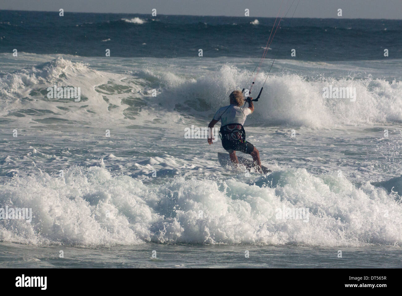 Kite surfing Kite surfer surfing in stormy waves sea ocean Redhead ...
