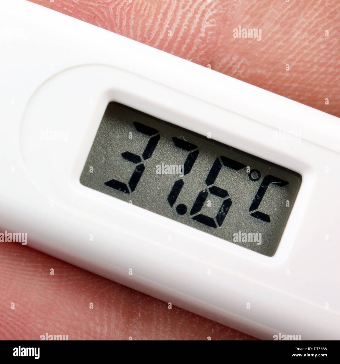 Thermometer in hand, closeup on white Stock Photo - Alamy