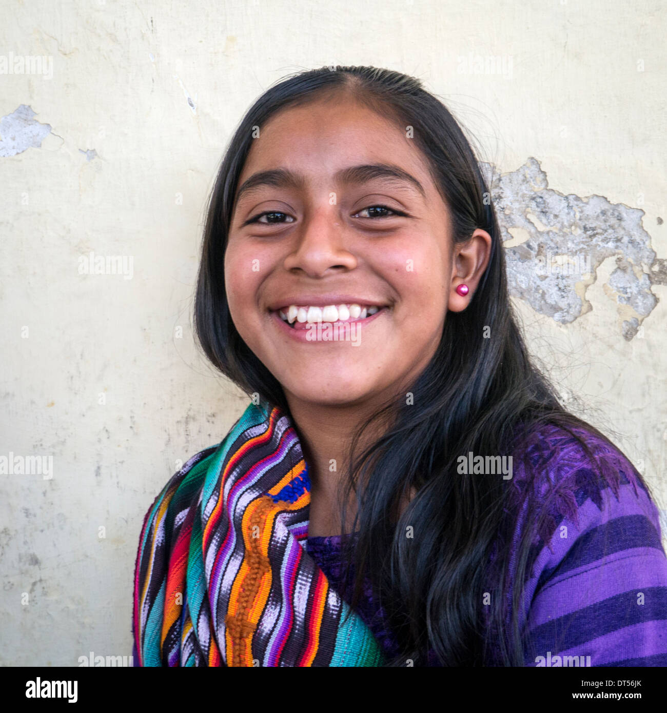 Portrait of smiling indigenous girl in Antigua, Guatemala Stock Photo ...
