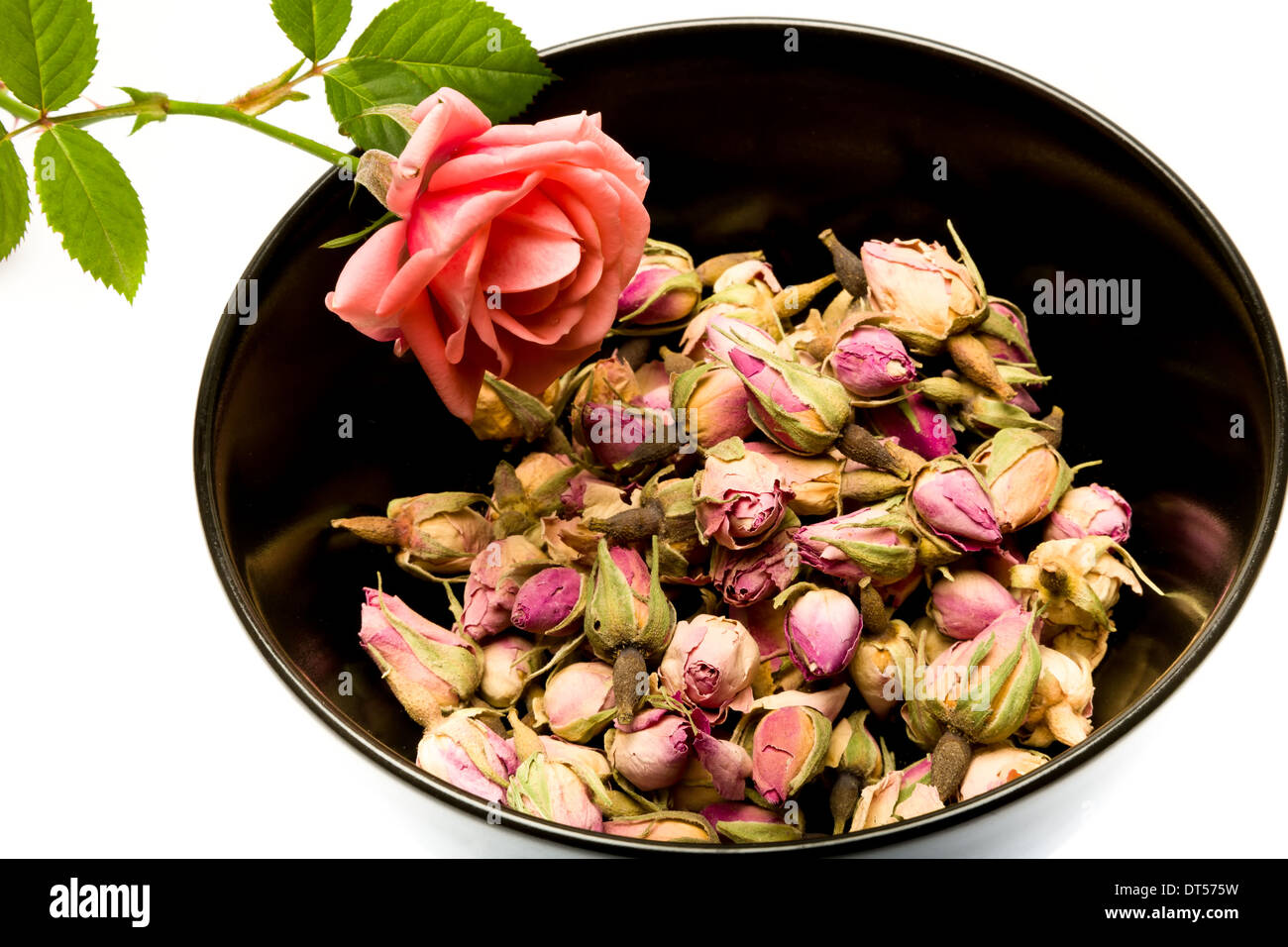 Fragrant and tasty tea made of dried rose buds Stock Photo - Alamy