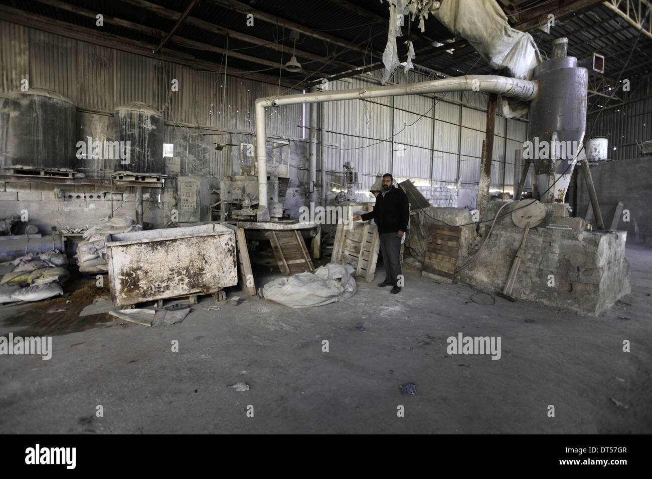 Gaza City. 9th Feb, 2014. A Palestinian worker is seen inside a ...