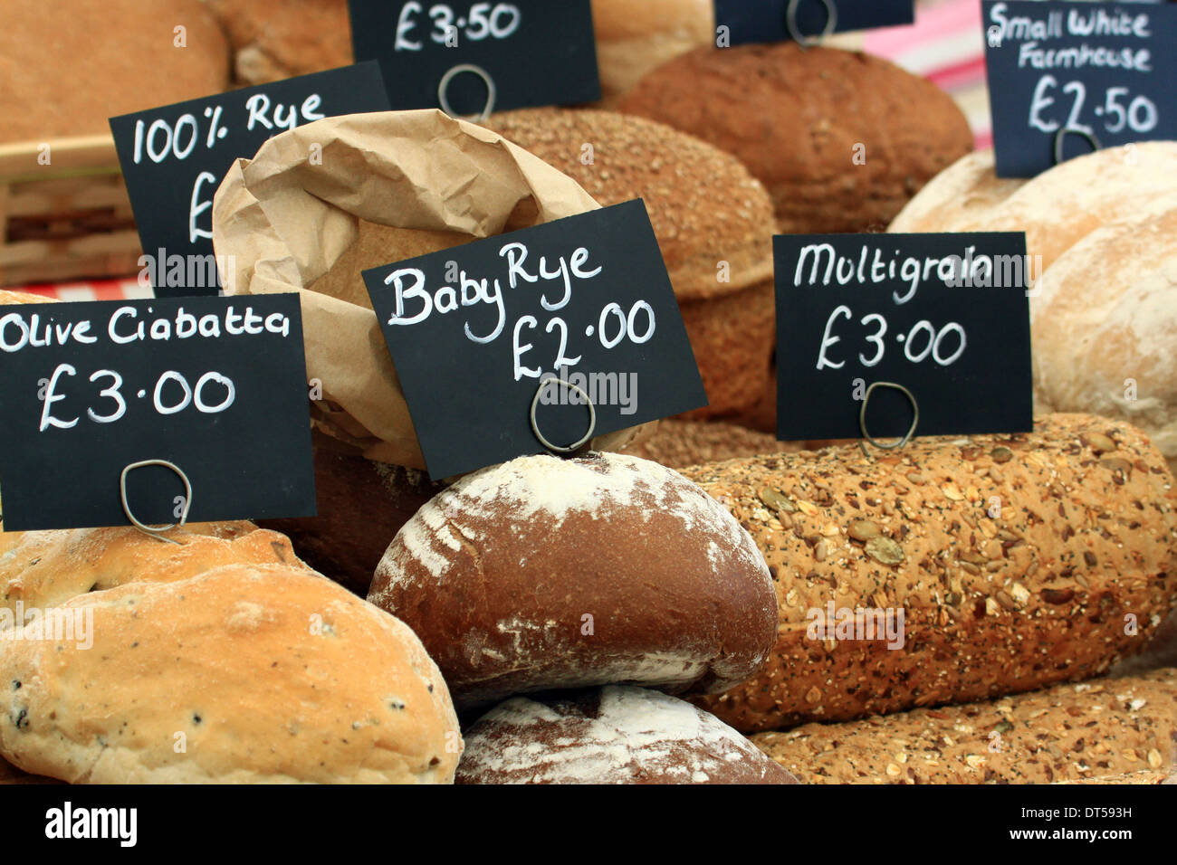 Rustic bread on sale on a farmers market stall Stock Photo - Alamy