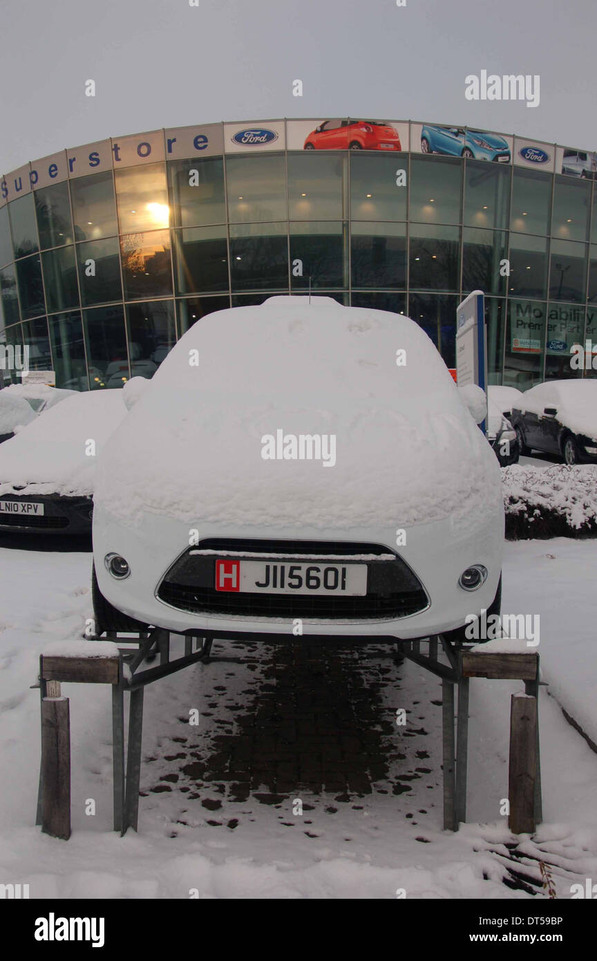 Snow covered cars at a car dealership in Colindale, London, England, Uk ...