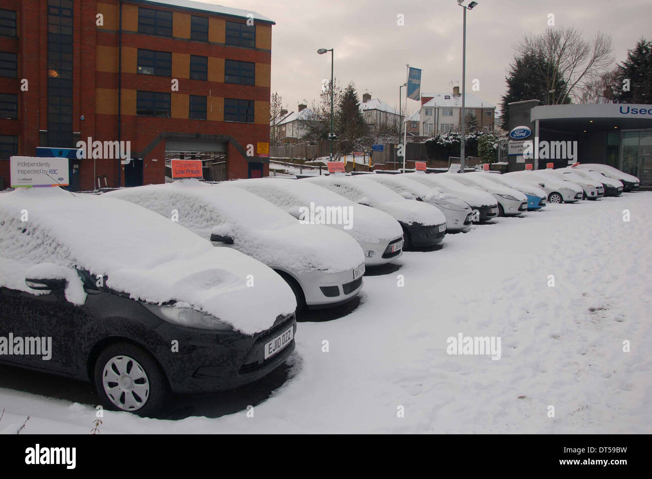 Snow covered cars at a car dealership in Colindale, London, England, Uk ...
