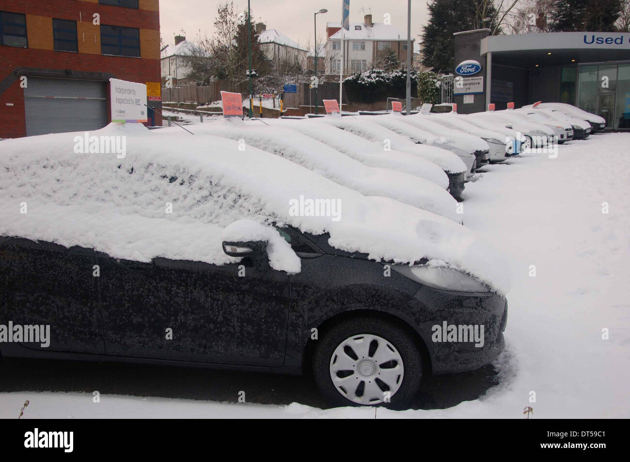 Snow covered cars at a car dealership in Colindale, London, England, Uk ...