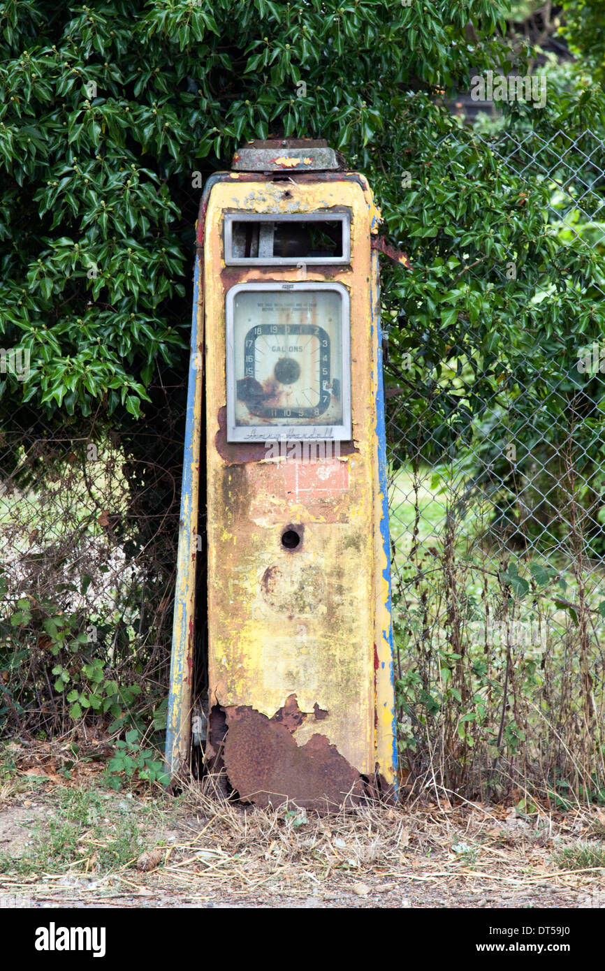 Old abandoned and rusty petrol pumps at the side of the road Stock ...
