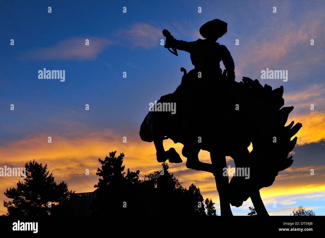 Bronco and cowboy statue in downtown Denver at sunset Stock Photo - Alamy