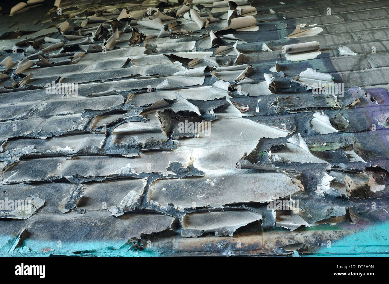 peeling paint gloss and emulsion due to fire inside a house with sooty ...
