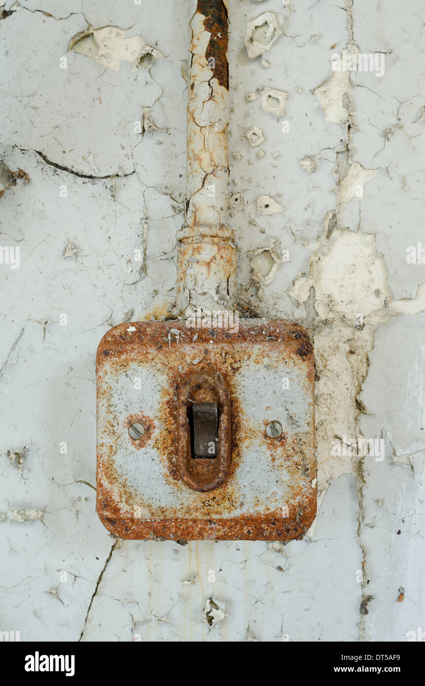 Dereliction of urban landscape rundown single rusty electrical light ...