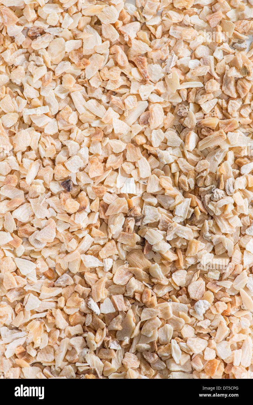 Rubbed Garlic as full screen background image Stock Photo - Alamy