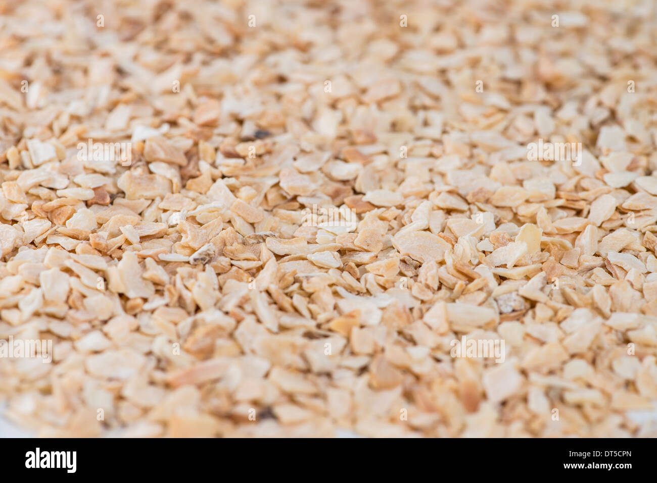Rubbed Garlic as full screen background image Stock Photo - Alamy