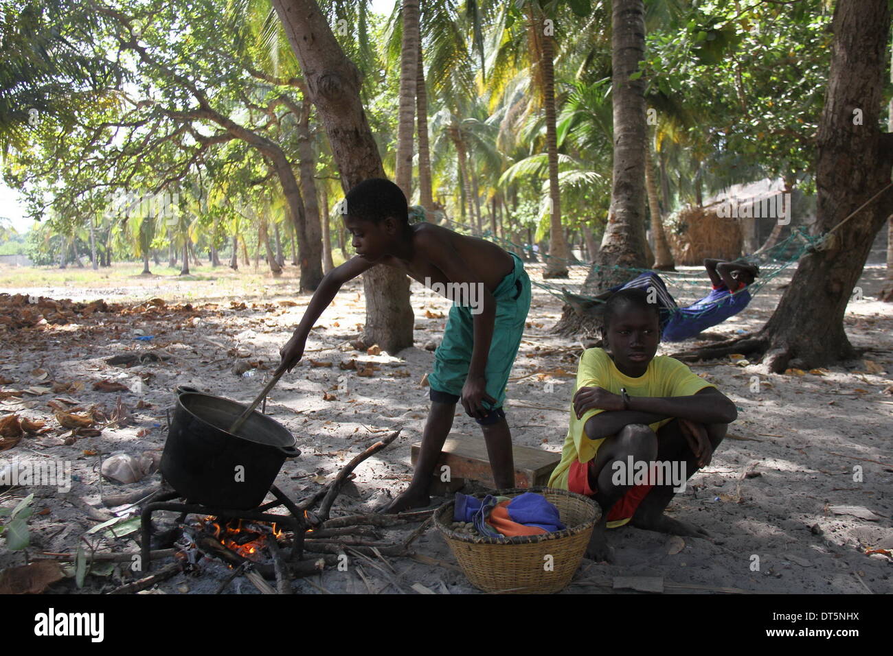 Dakar, Senegal. 4th Feb, 2014. Children cook food in a village of Jola ...