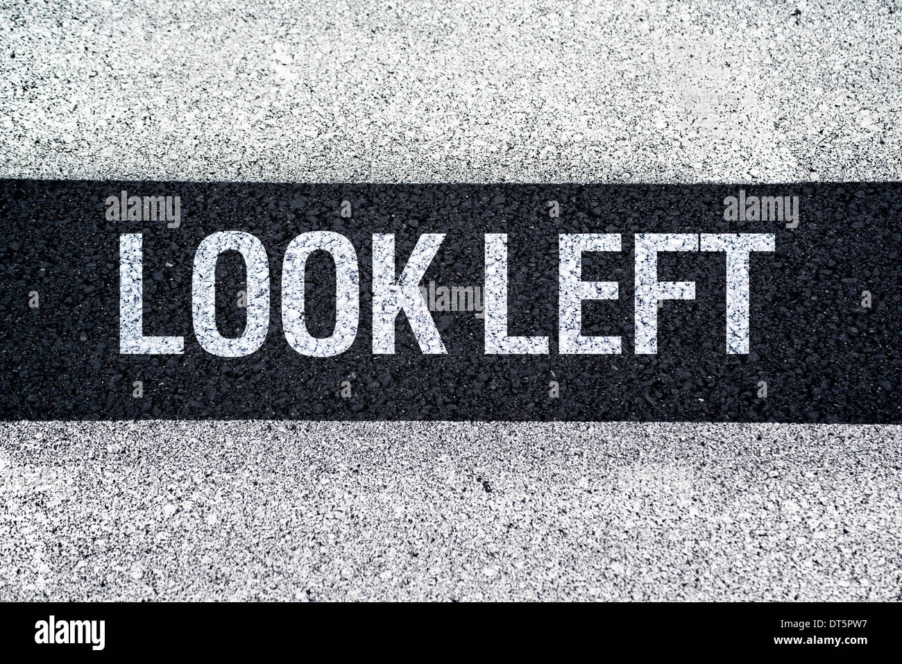 Look left on Pedestrian crossing, zebra traffic walk way on asphalt ...