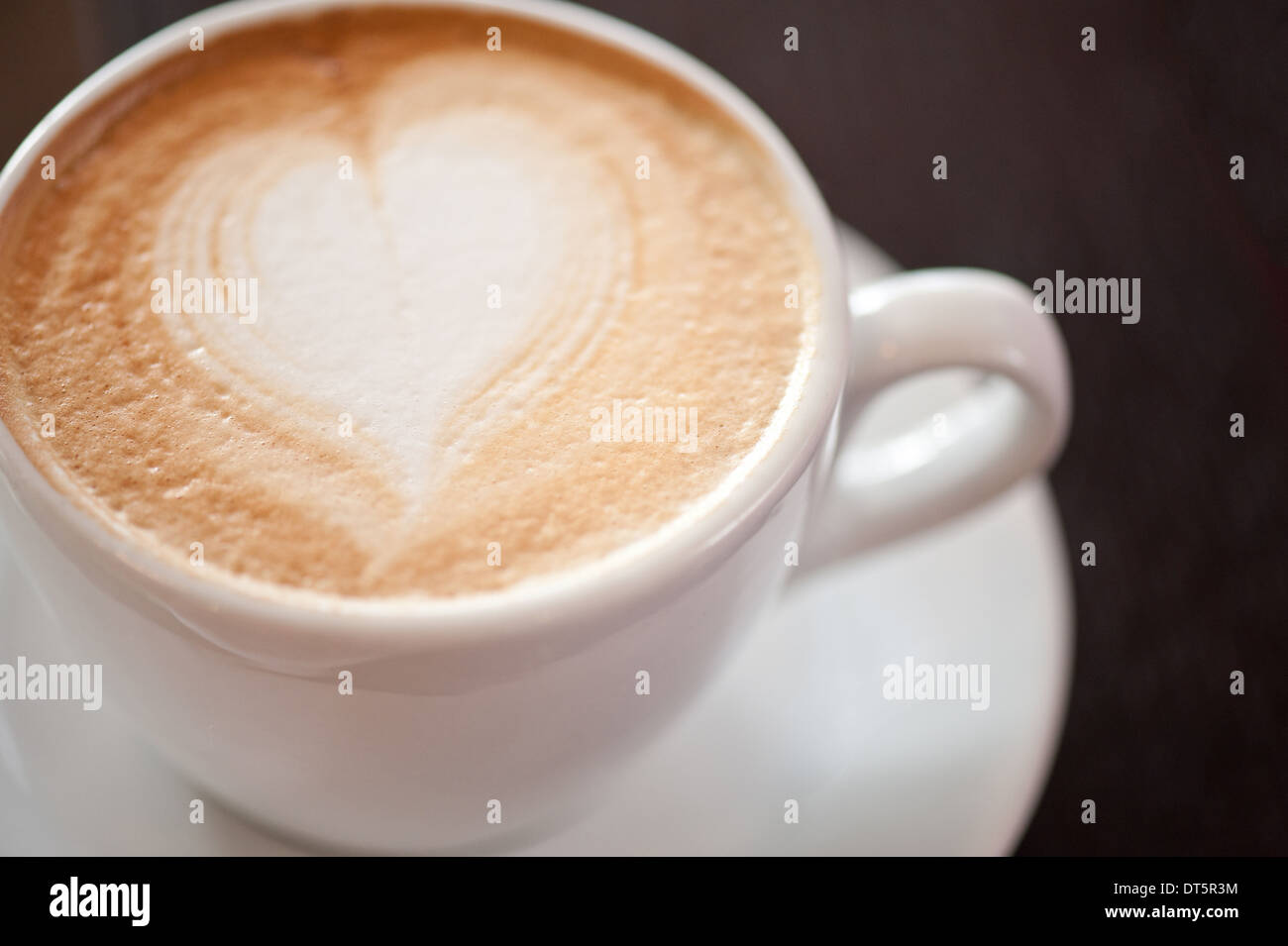 Coffee heart shape Stock Photo - Alamy