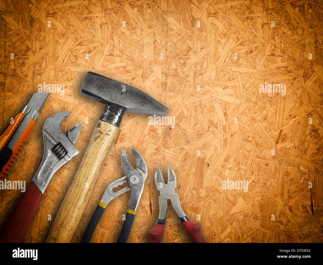 Set of tools over a wood panel Stock Photo - Alamy