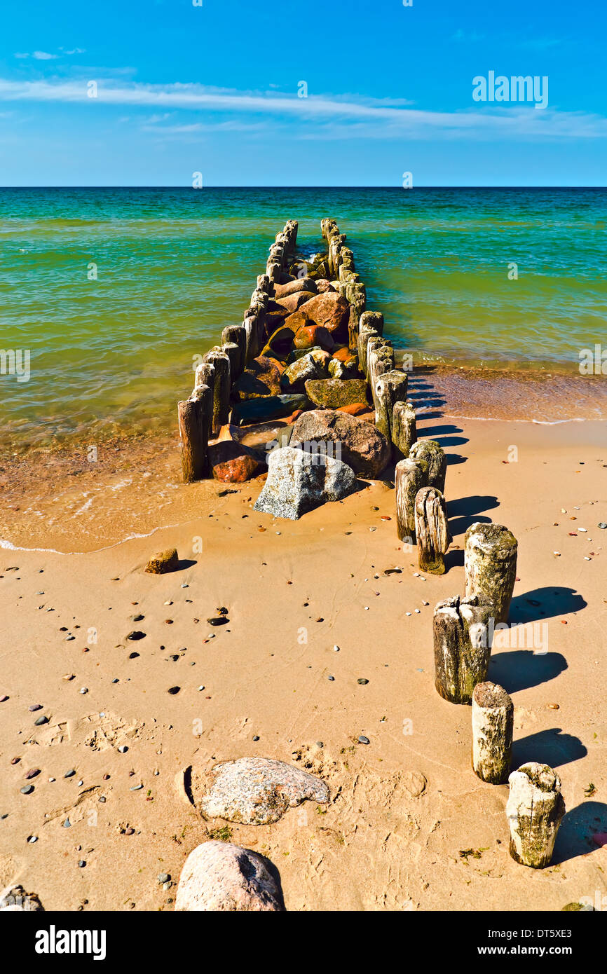 Beach, sea, breakwater Stock Photo - Alamy