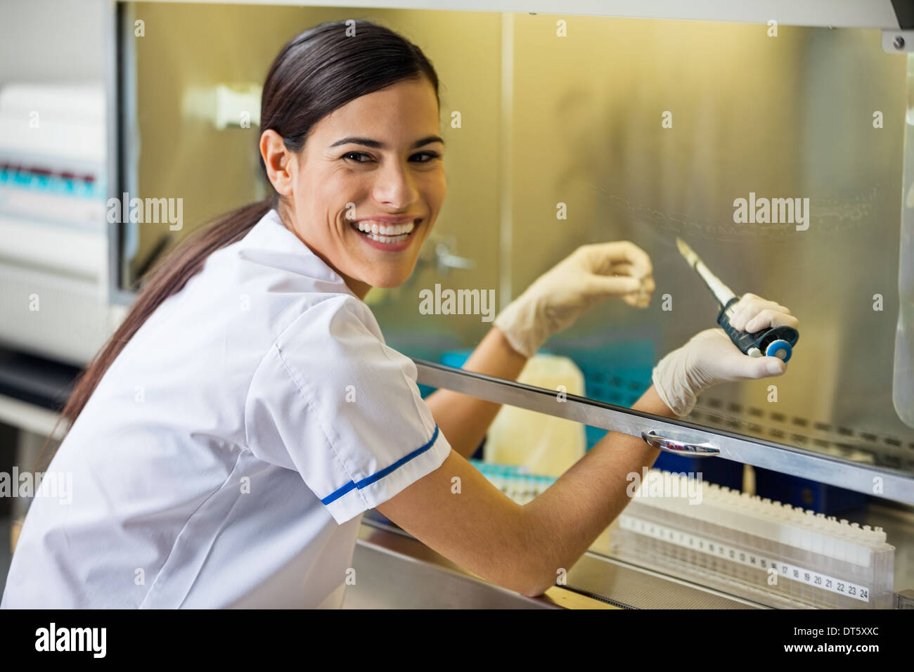 Female Researcher Experimenting In Laboratory Stock Photo - Alamy