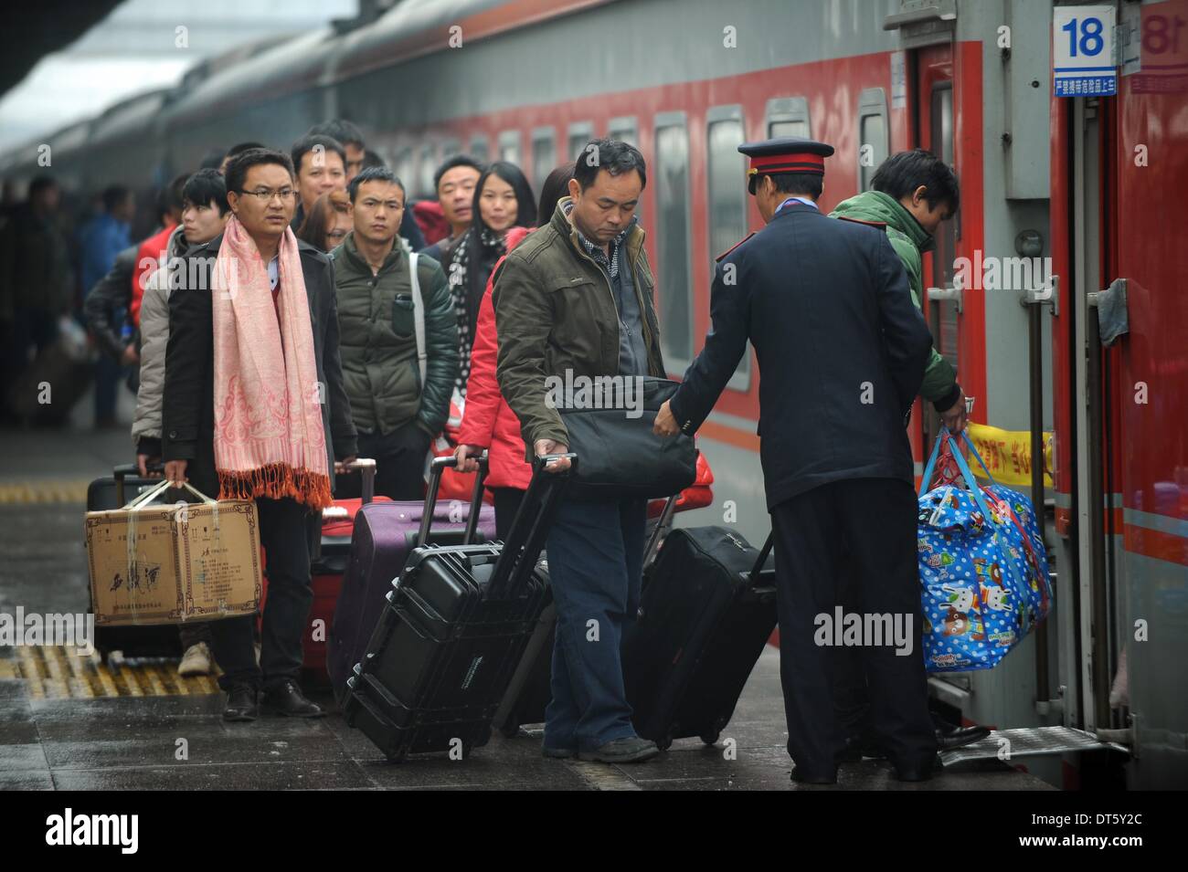 Chengdu, China's Sichuan Province. 10th Feb, 2014. Passengers prepare ...