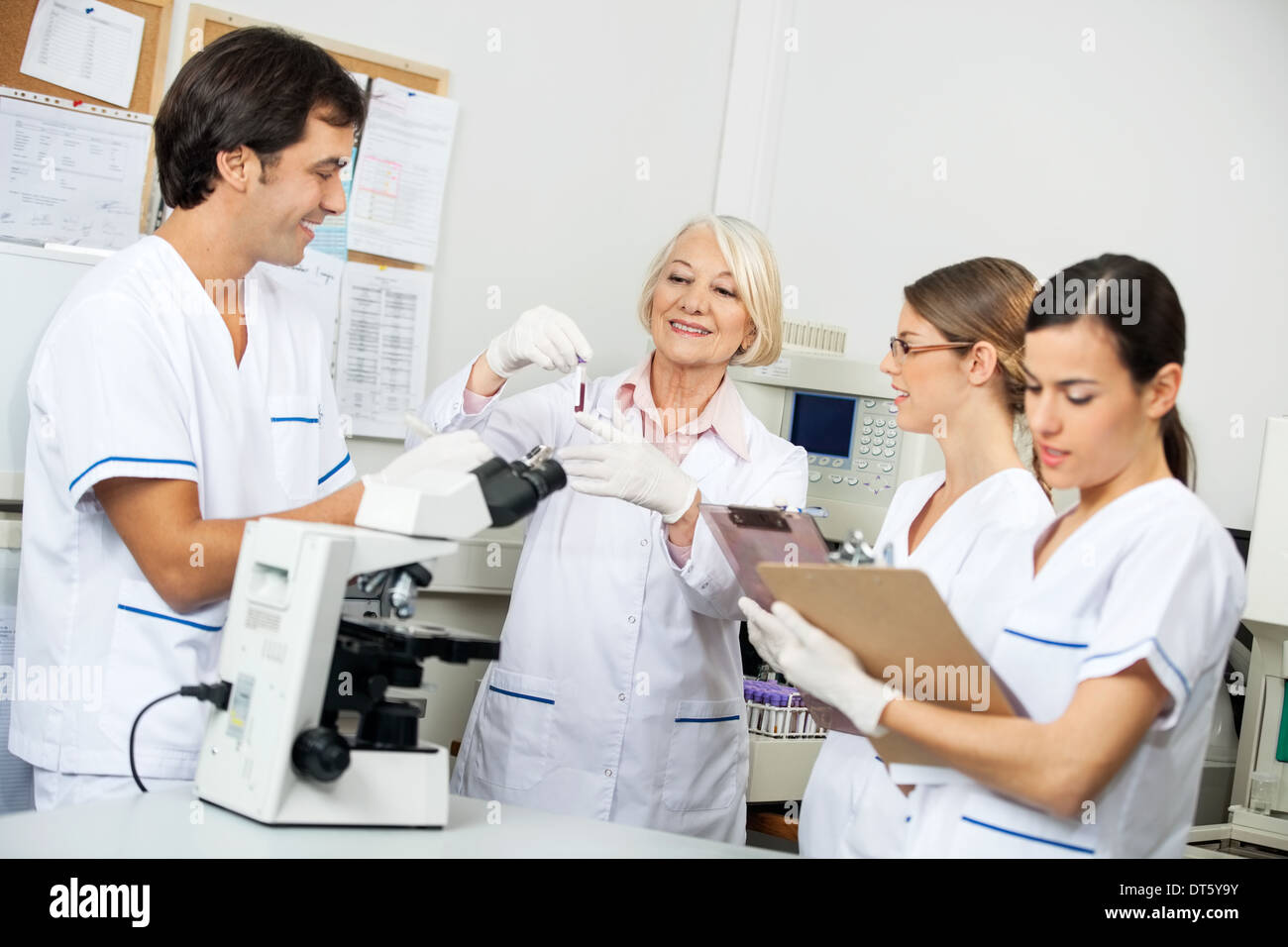 Scientists sample in laboratory hi-res stock photography and images - Alamy