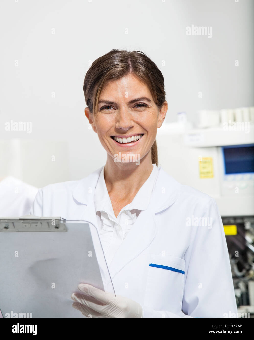 Laboratory assistant holding medical hi-res stock photography and ...