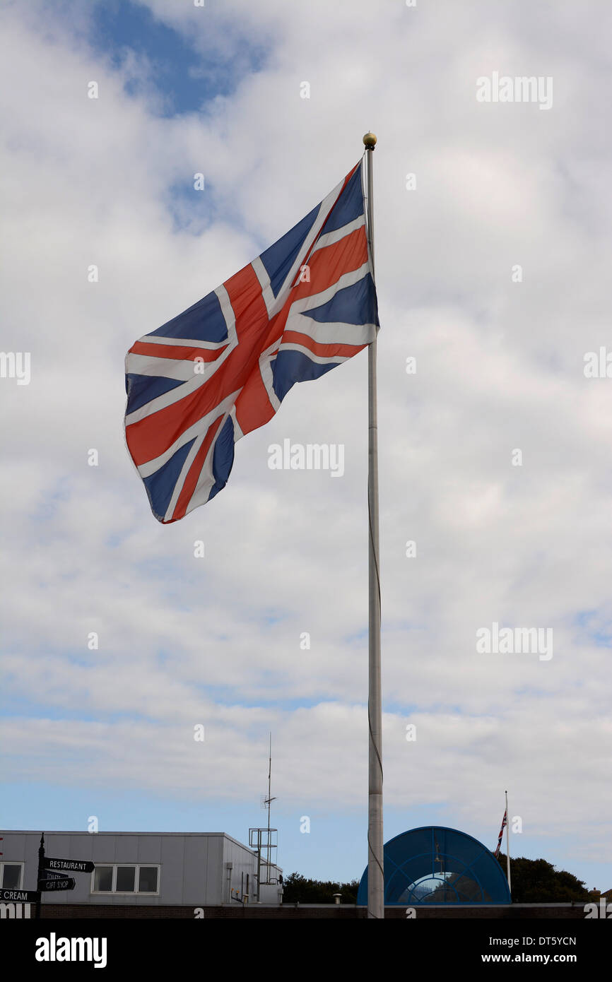 Union flag of Great Britain or Union Jack flying from mast at ...