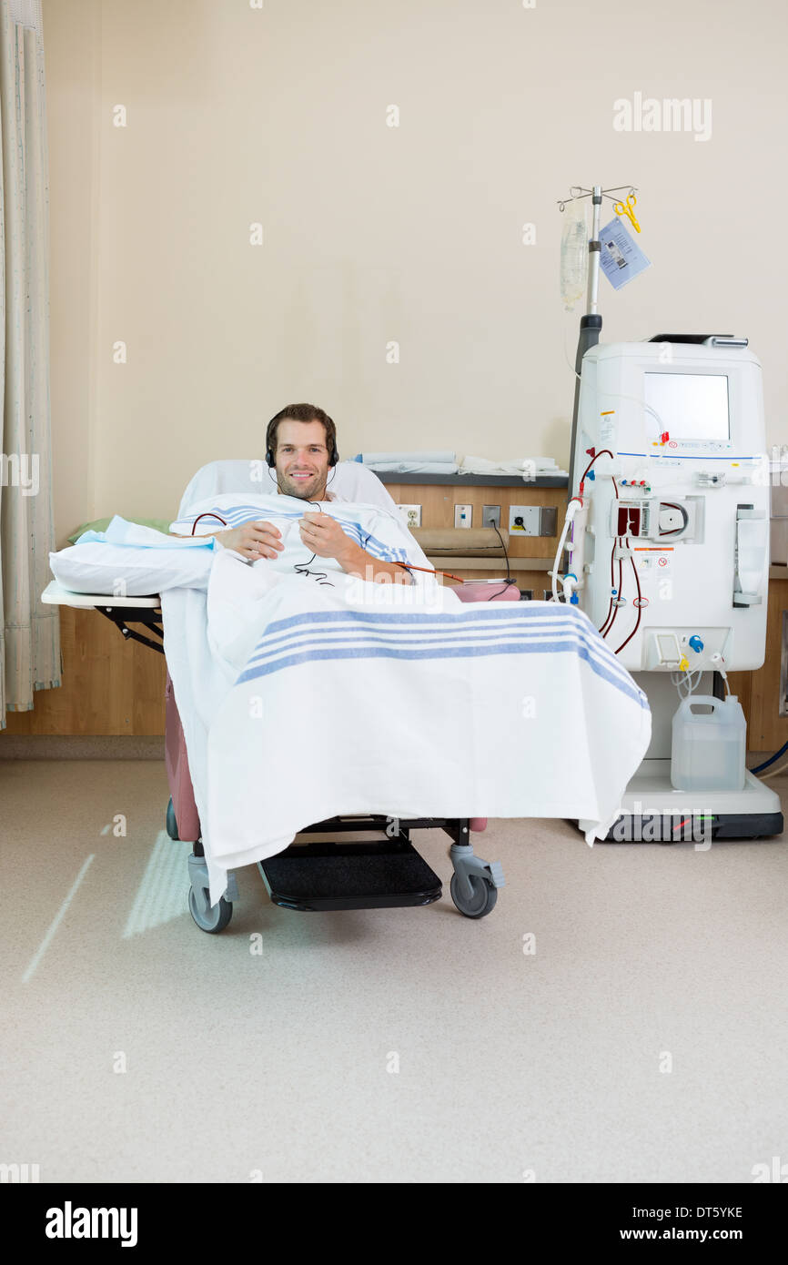 Patient Listening Music While Receiving Renal Dialysis Stock Photo - Alamy