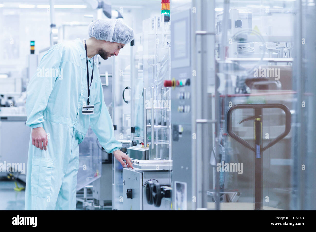 Laboratory technician checking the process Stock Photo - Alamy
