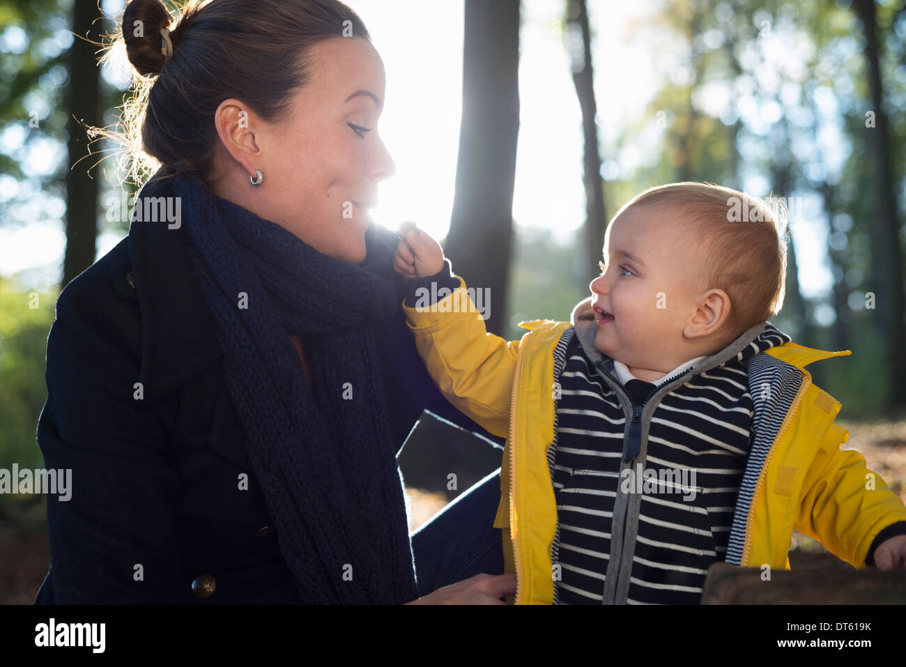 Mother looking after young hi-res stock photography and images - Alamy