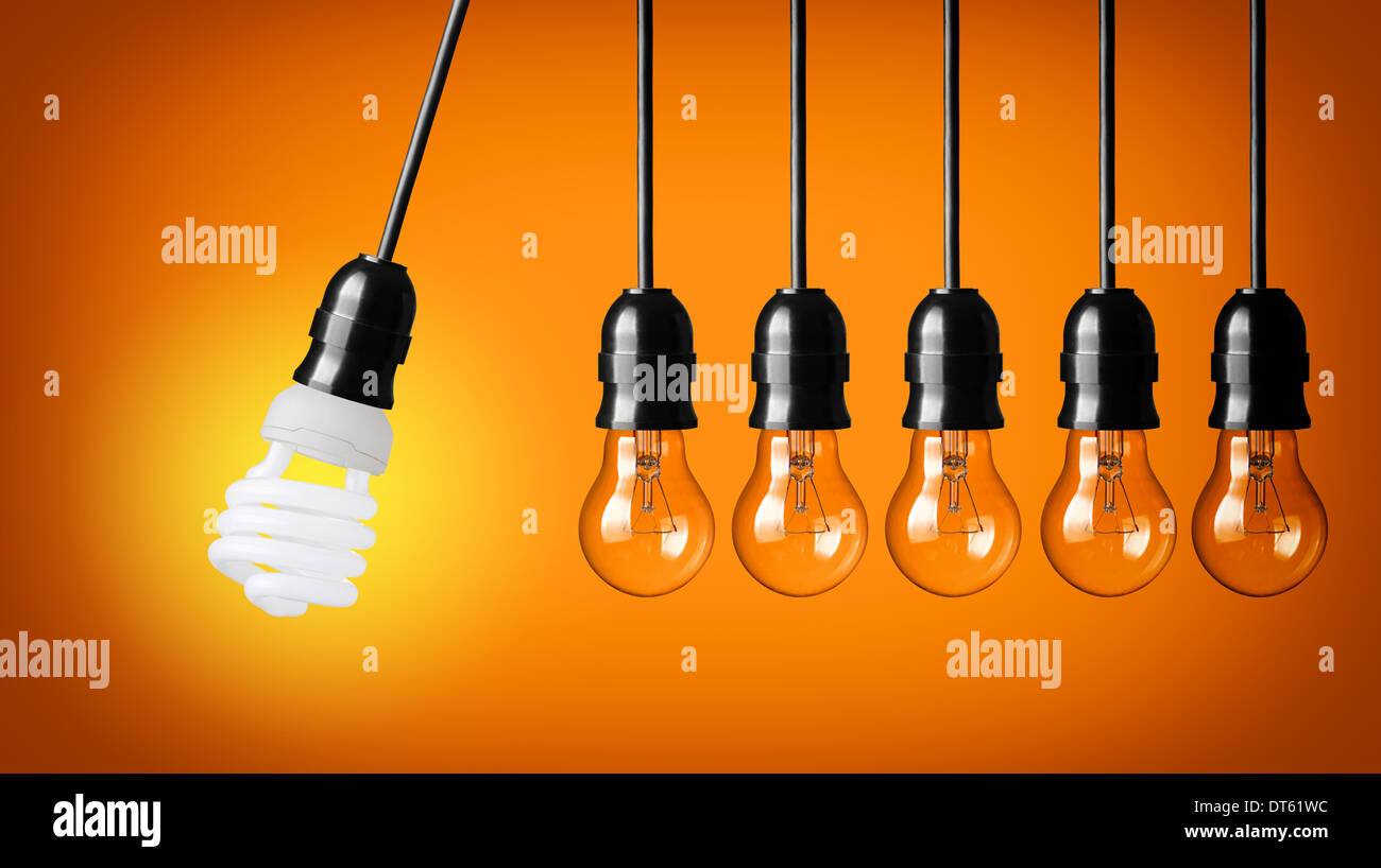 Perpetual motion with light bulbs and energy saver bulb. Idea concept ...