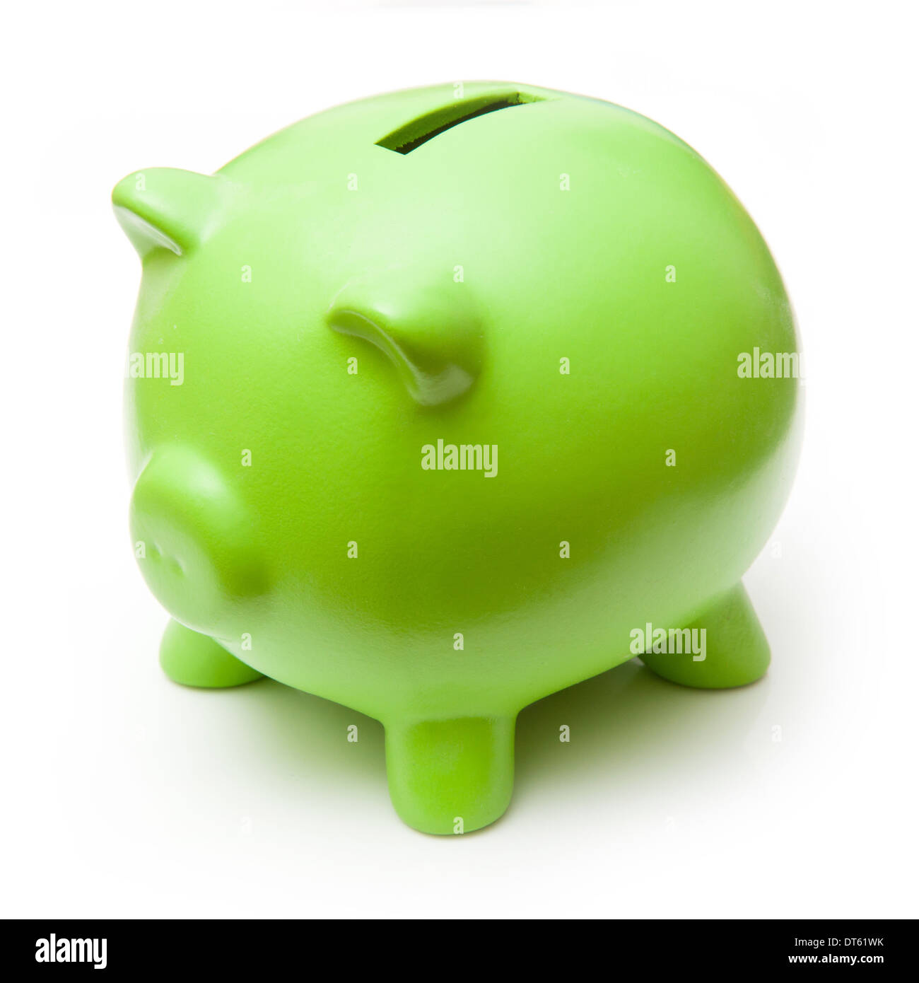 Green piggy bank money box isolated on a white studio background Stock ...
