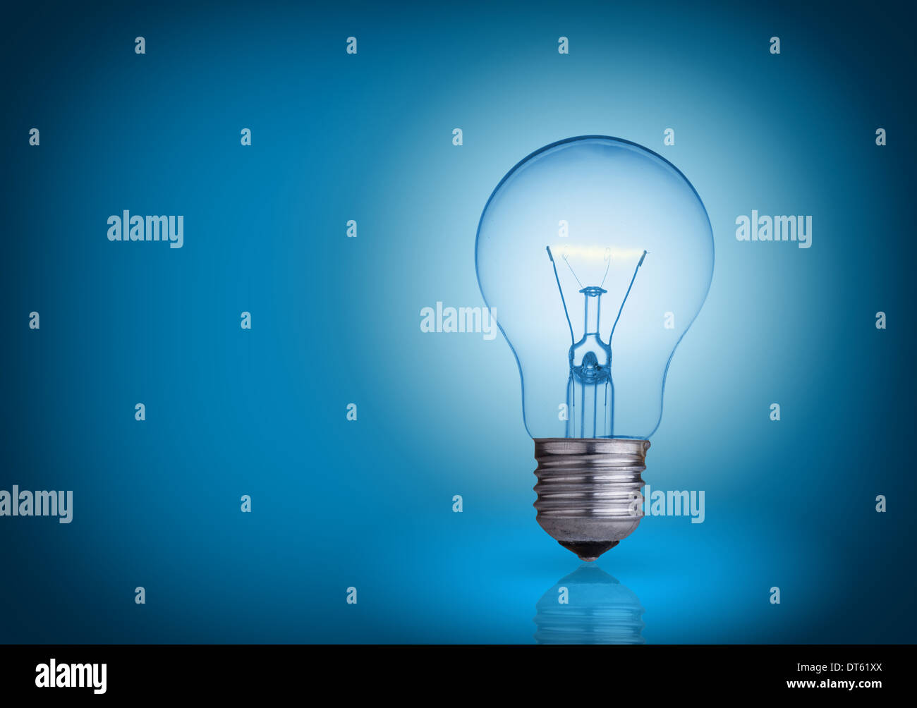 light bulb on blue background Stock Photo - Alamy