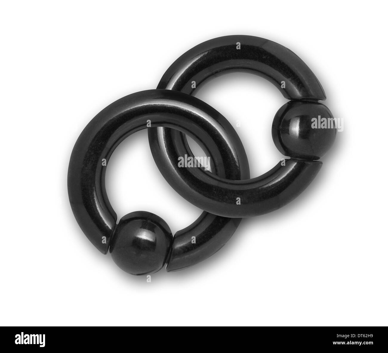 Piercing earrings isolated on white background Stock Photo - Alamy