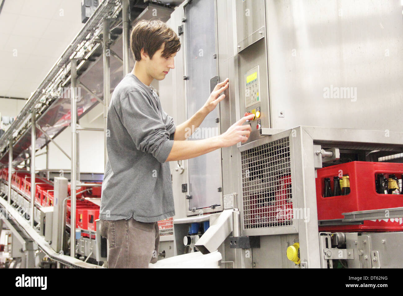 Man using control panel in brewery Stock Photo - Alamy