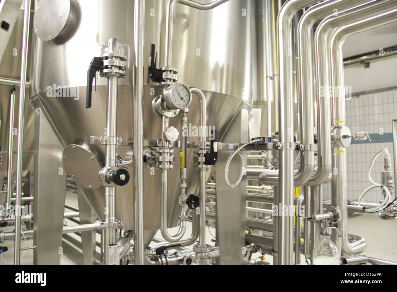 Vat and tubes in brewery Stock Photo - Alamy