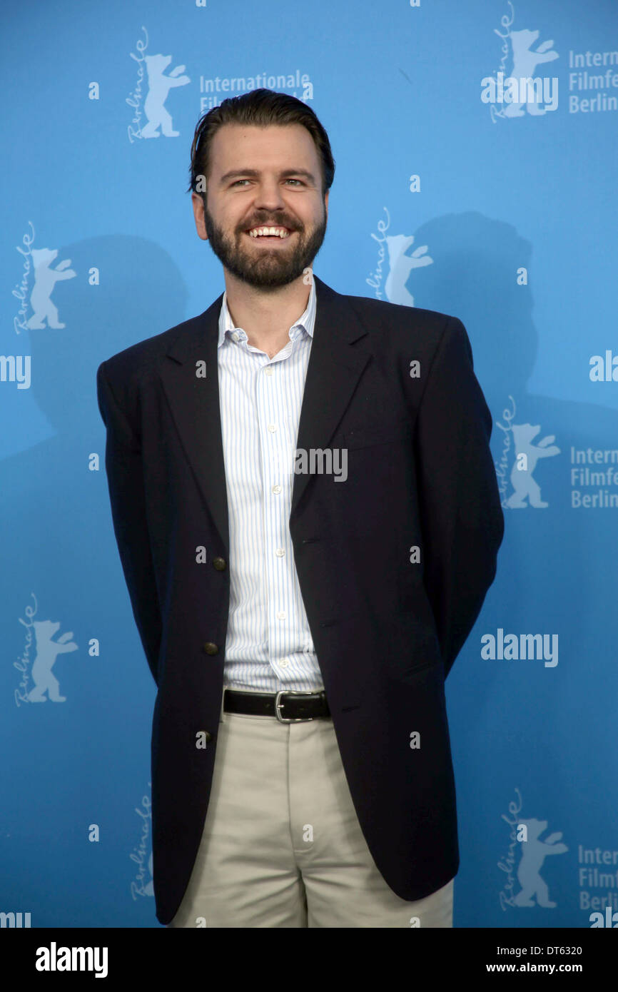 Berlin, Germany. 10th Feb, 2014. Director A.J. Edwards poses during the ...