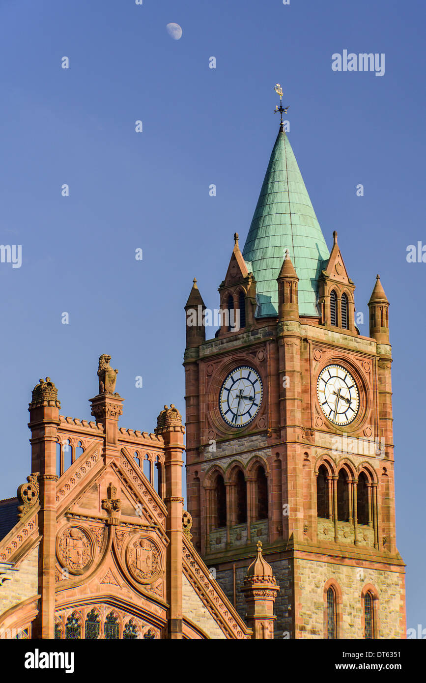 Ireland, Derry, The Guildhall, The Clock Tower with moon in the sky ...